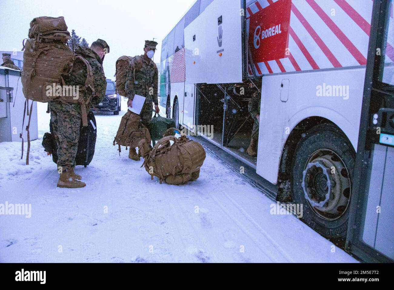 U.S. Marines with 2d Marine Expeditionary Brigade prepare to board the ...