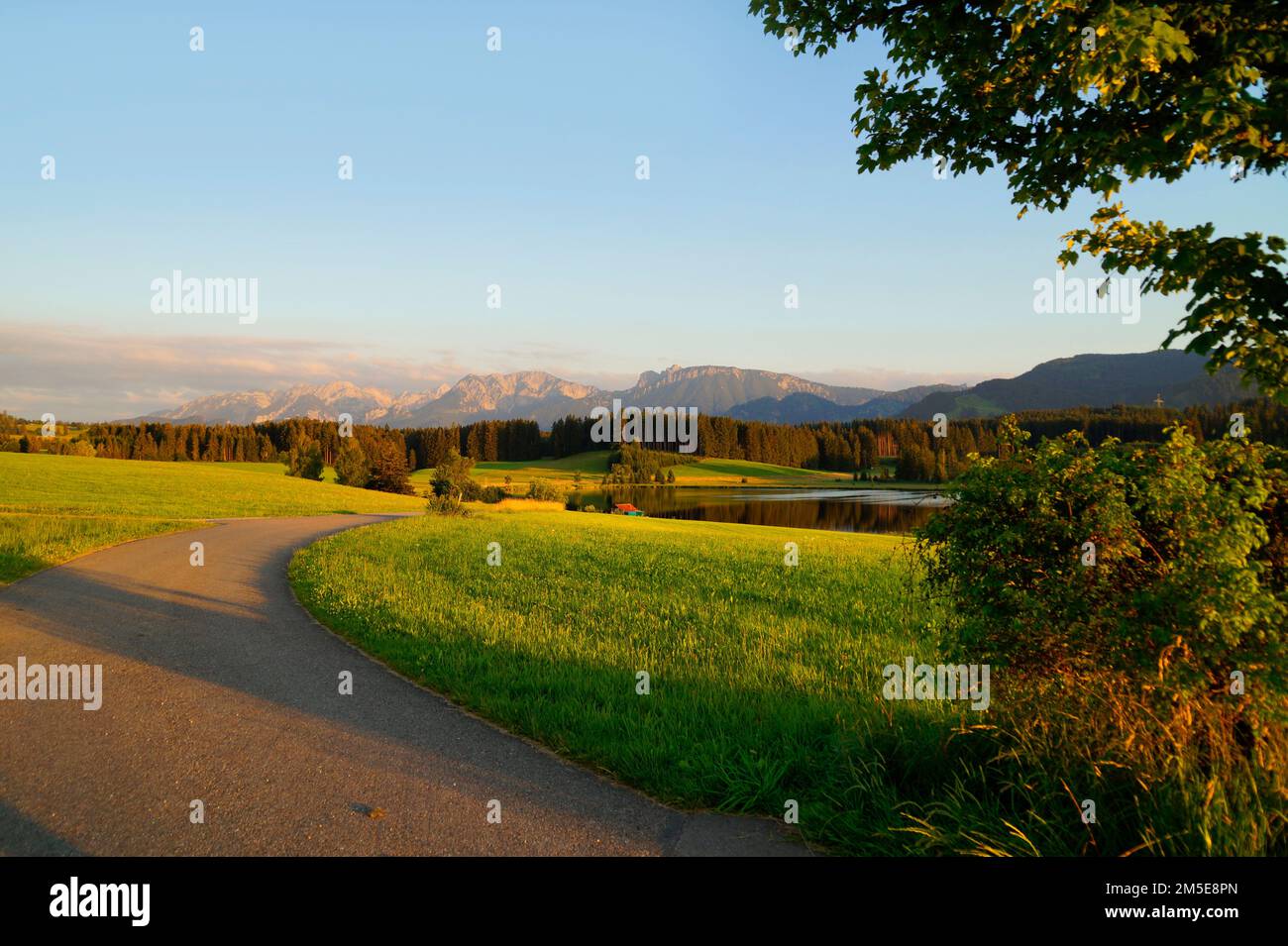 scenic alpine lake Attlesee and the lush alpine valley with its endless ...