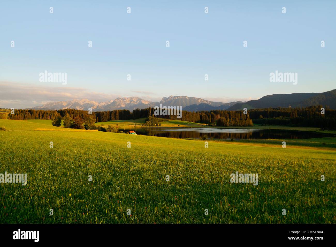 scenic alpine lake Attlesee and the lush alpine valley with its endless ...