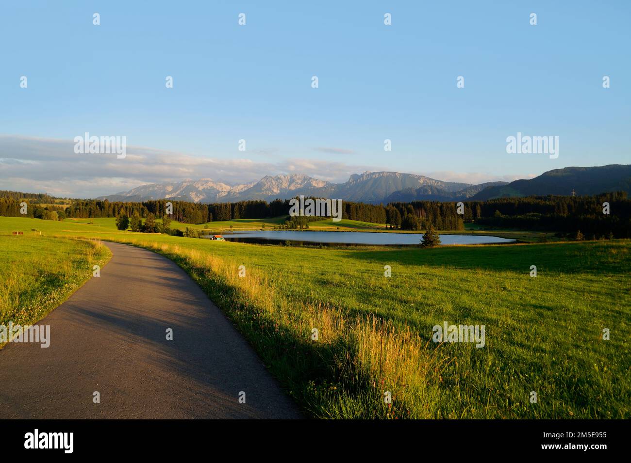 scenic alpine lake Attlesee and the lush alpine valley with its endless ...