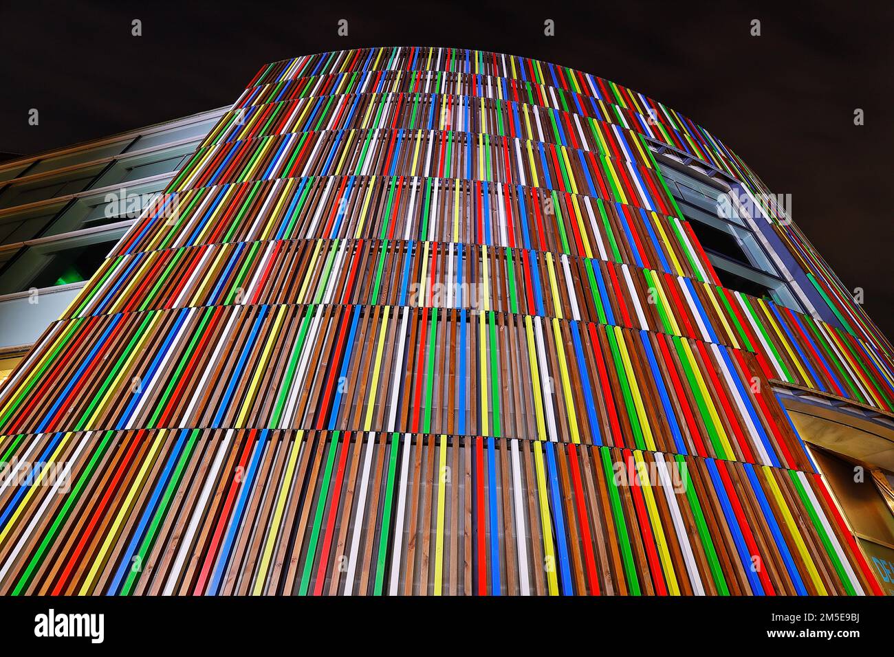 Coloured stripey cladded building at Leeds Dock in West Yorkshire,UK ...