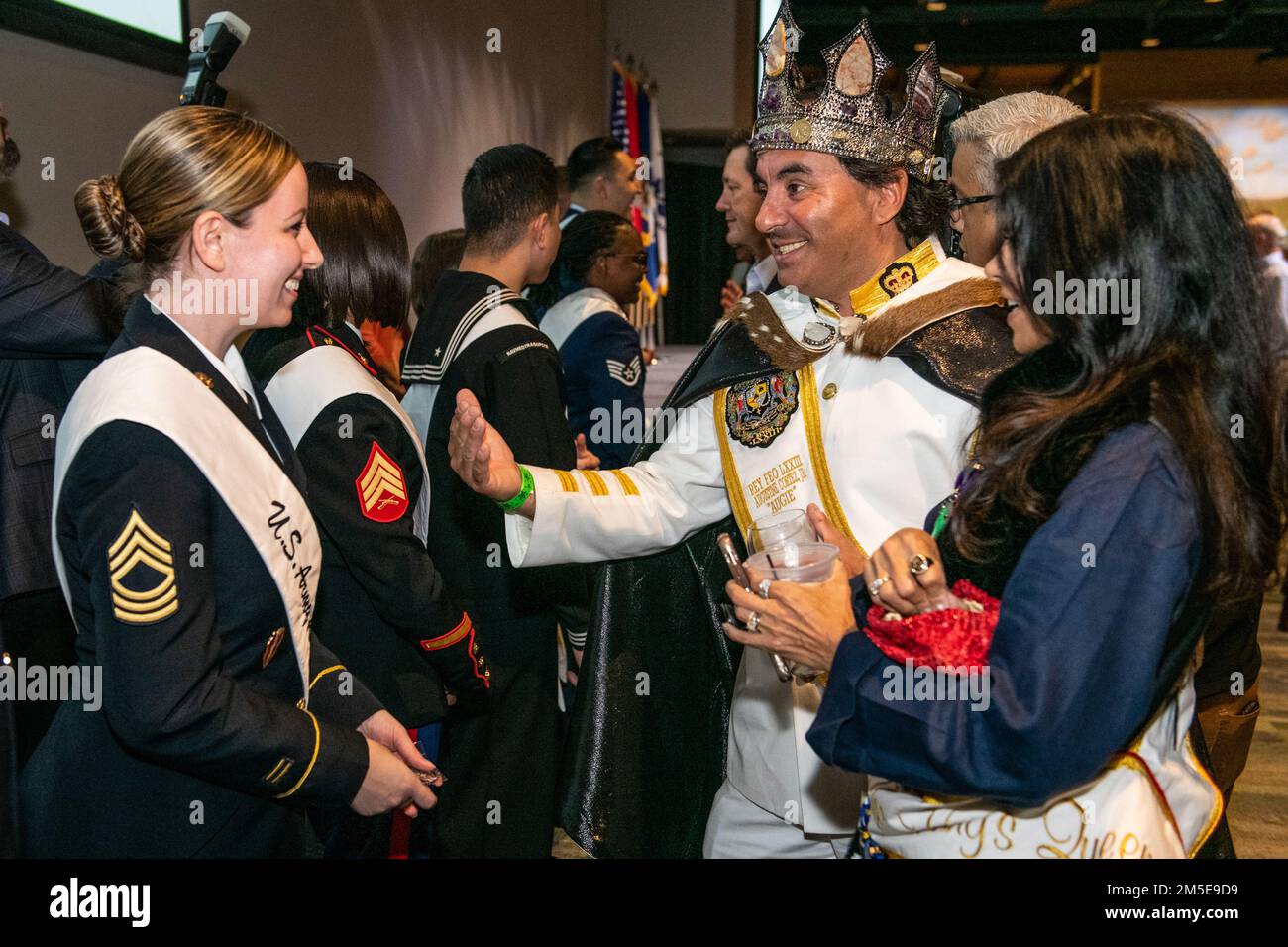 Augustine Cortez Jr., 2022 El Rey Feo, greets U.S. Army Master Sgt ...