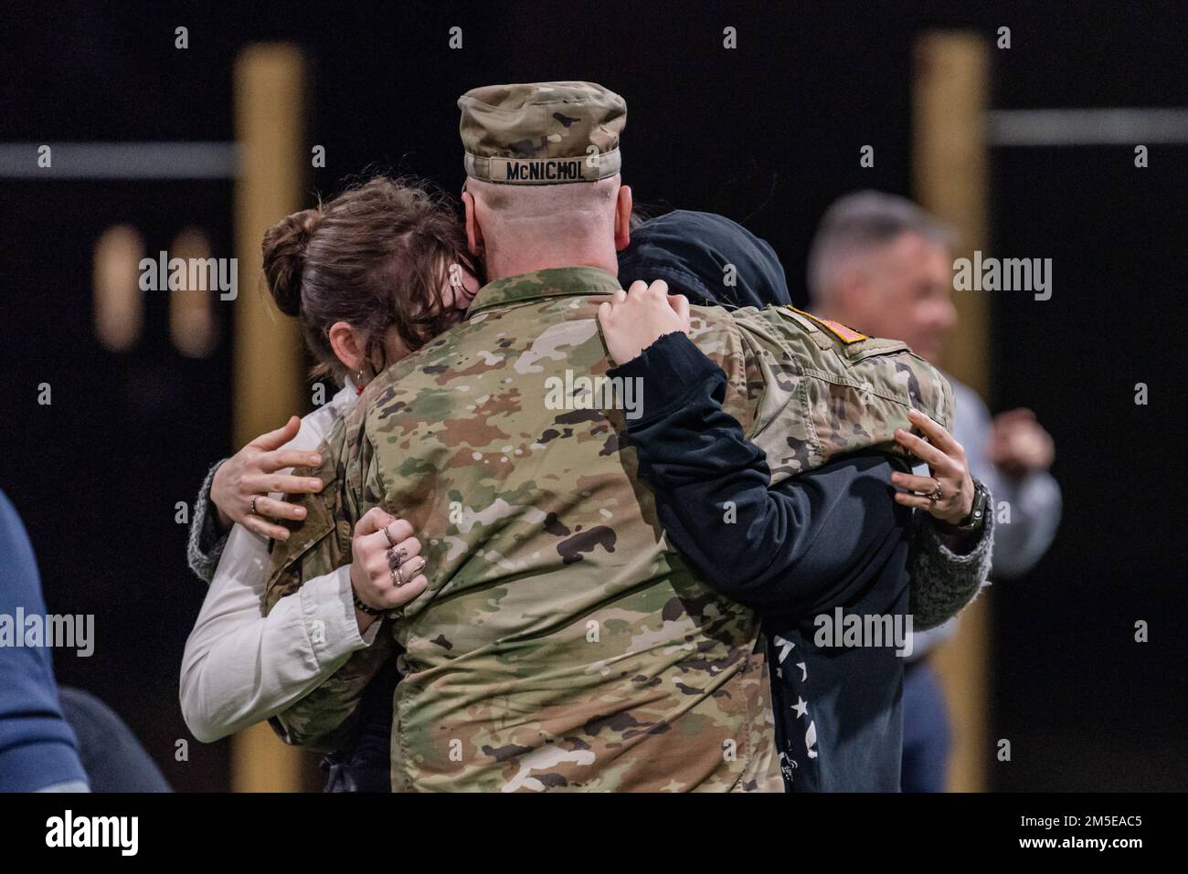 FORT KNOX, Ky. - Lt. Col. Sean McNichol hugs his Family goodbye prior ...