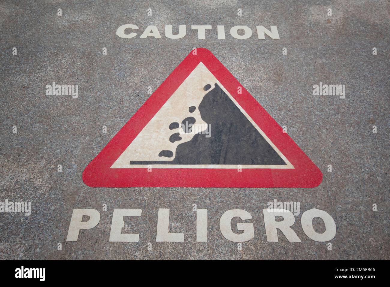 A top view of a Spanish road sign - Translation: Caution Danger Stock ...