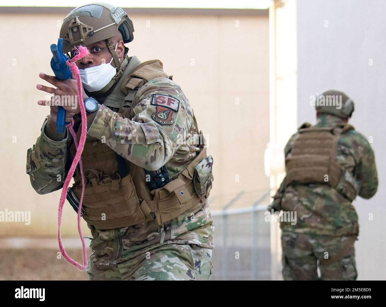Tech. Sgt. Cameron Phillips, right, and Tech. Sgt. Jay Porter, left ...