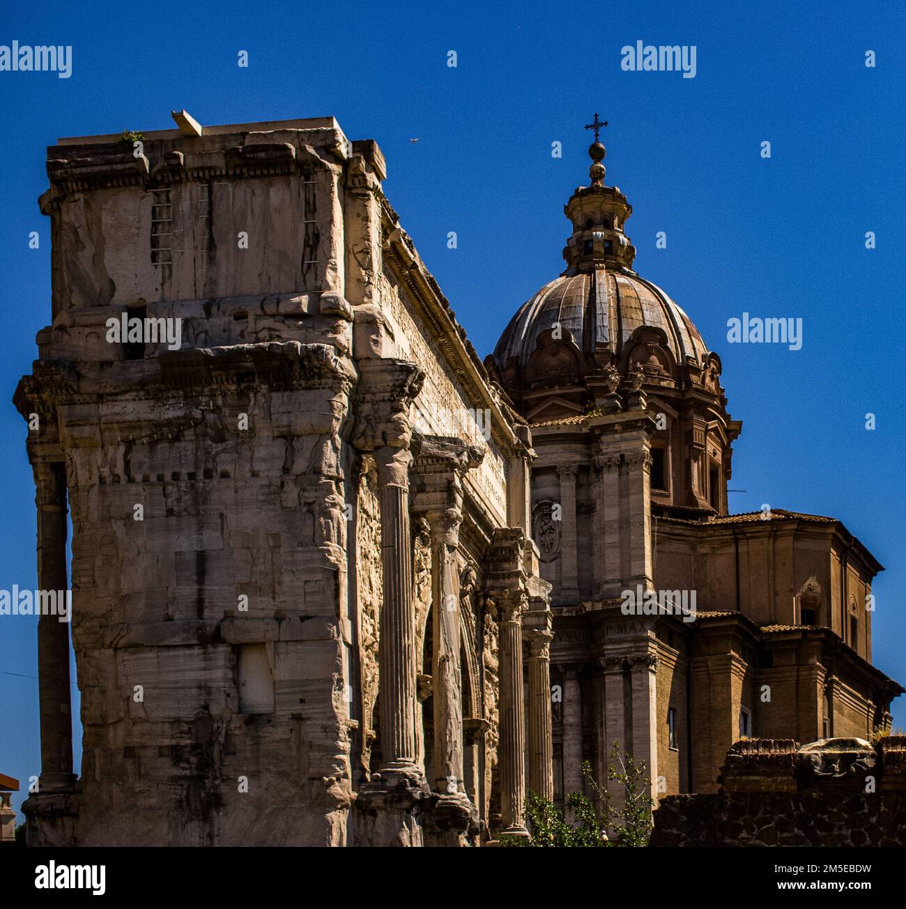 A side view angle of the Arch of Septimius Severus at the Roman Forum ...