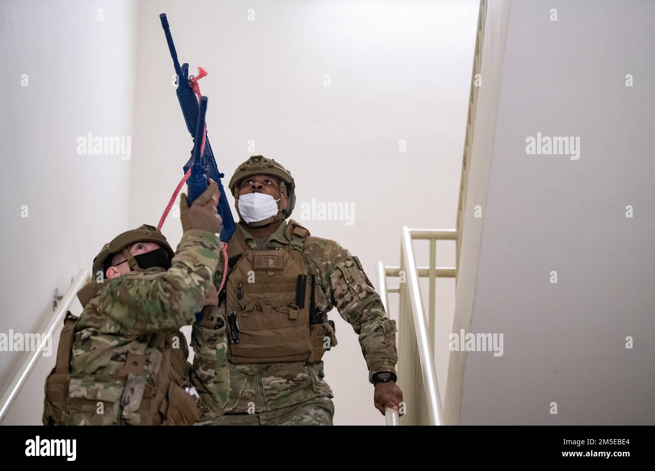 Tech. Sgt. Cameron Phillips, left, and Tech. Sgt. Jay Porter, right ...