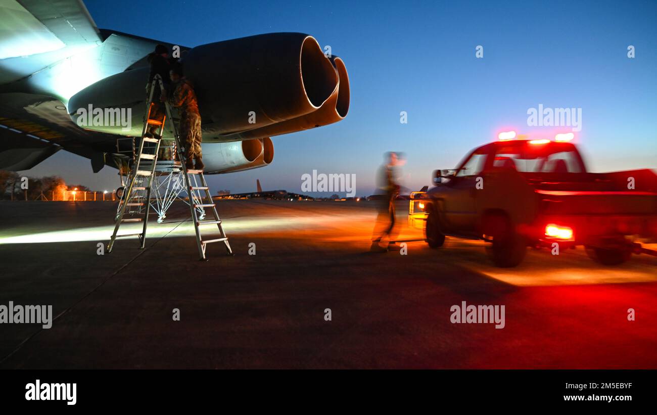 U.S. Air Force maintenance Airmen conduct post flight inspections on a ...
