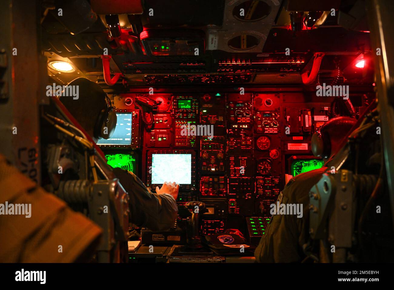 U.S. Air Force 1st Lt. Leo Morales (left), radar navigator, and Lt. Col ...