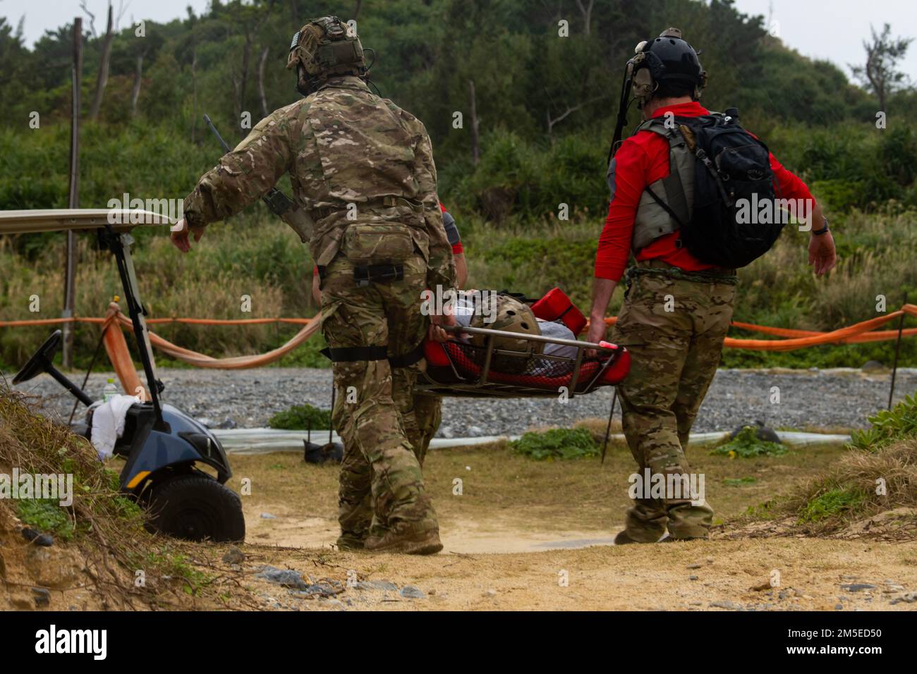 Two U.S. Air Force pararescuemen assigned to the 31st Rescue Squadron ...