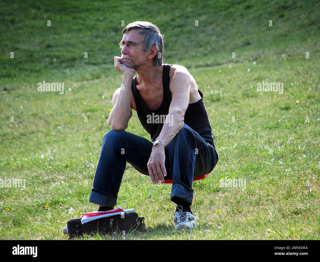 Kiev, Ukraine May 9, 2009: A man sits thoughtfully in the air without ...