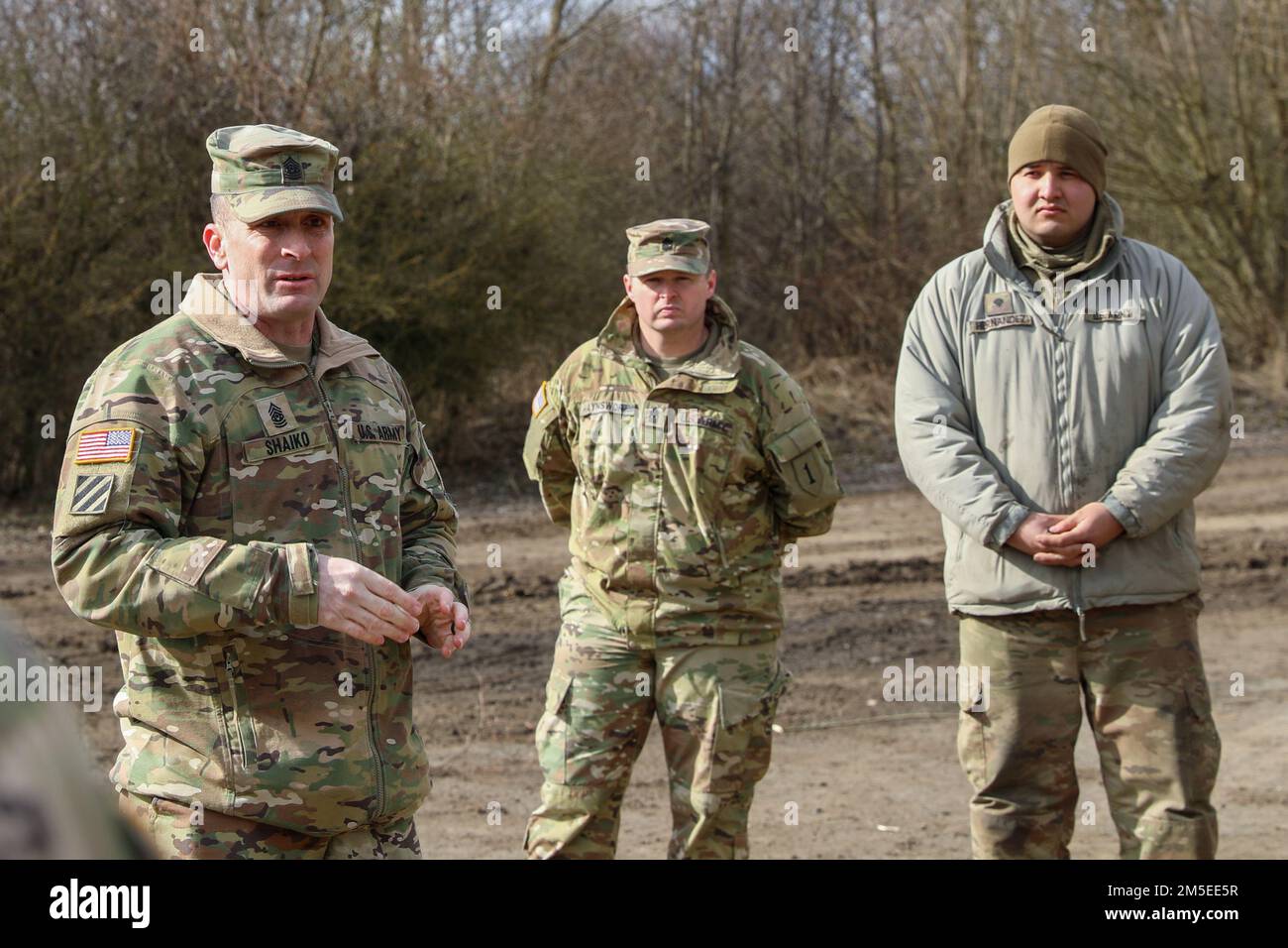 From left, Command Sgt. Maj. Christopher Shaiko, command sergeant major of 1st Armored Brigade ...