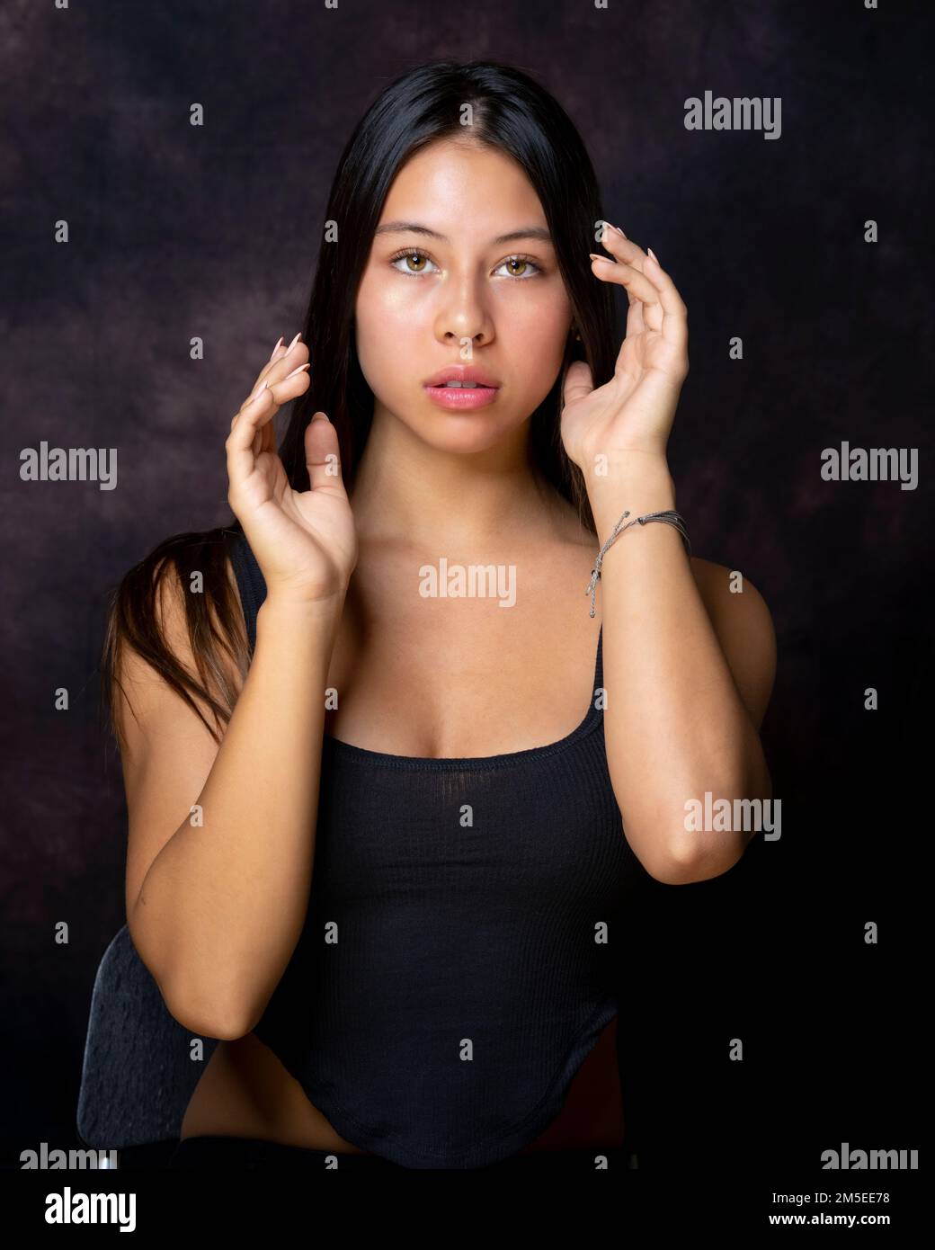 Half Body Portrait of Multiracial Teen Female Seated with Hands Framing ...
