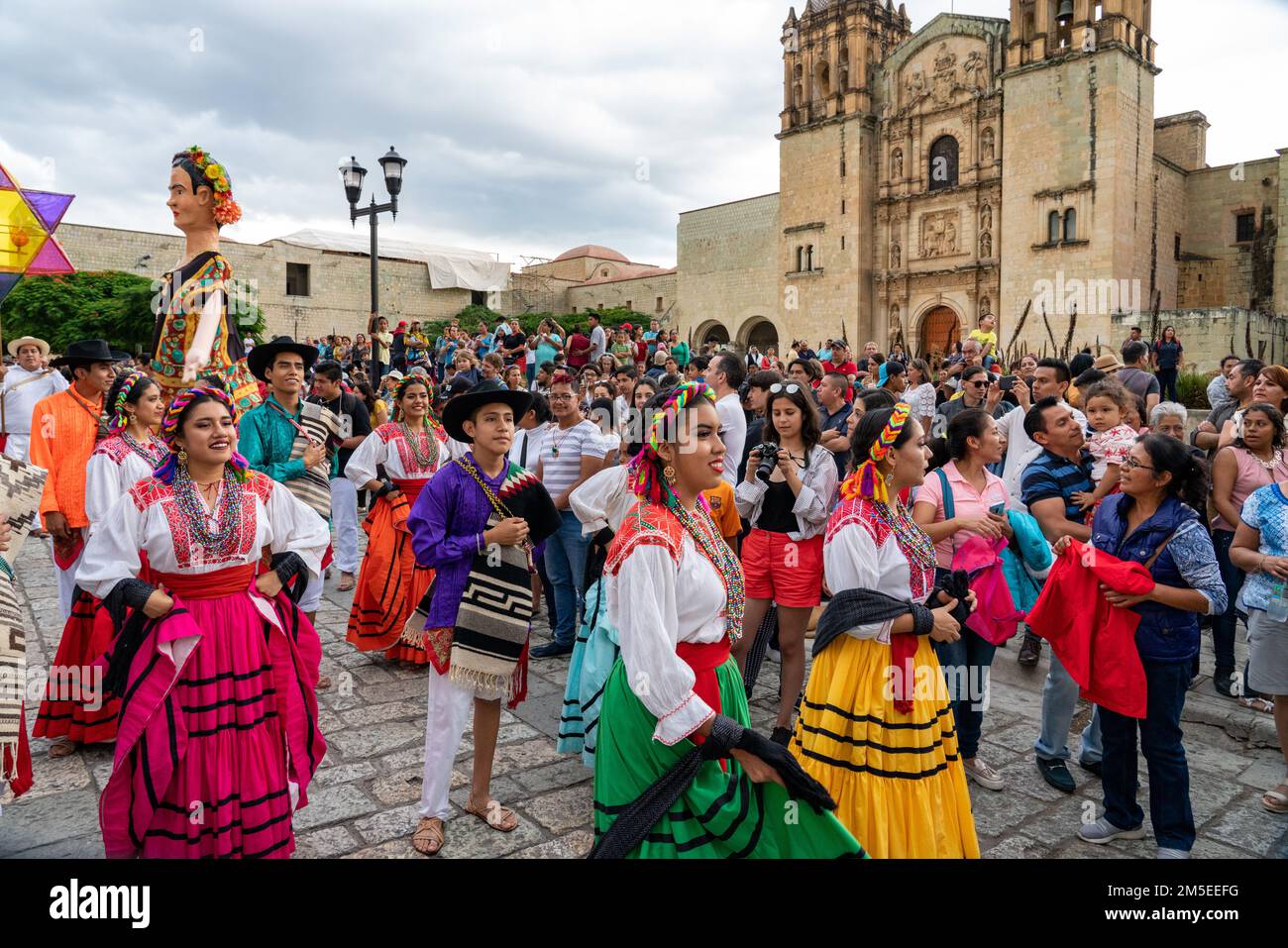 Folk dancers from Ejutla in traditional dress parade through the ...