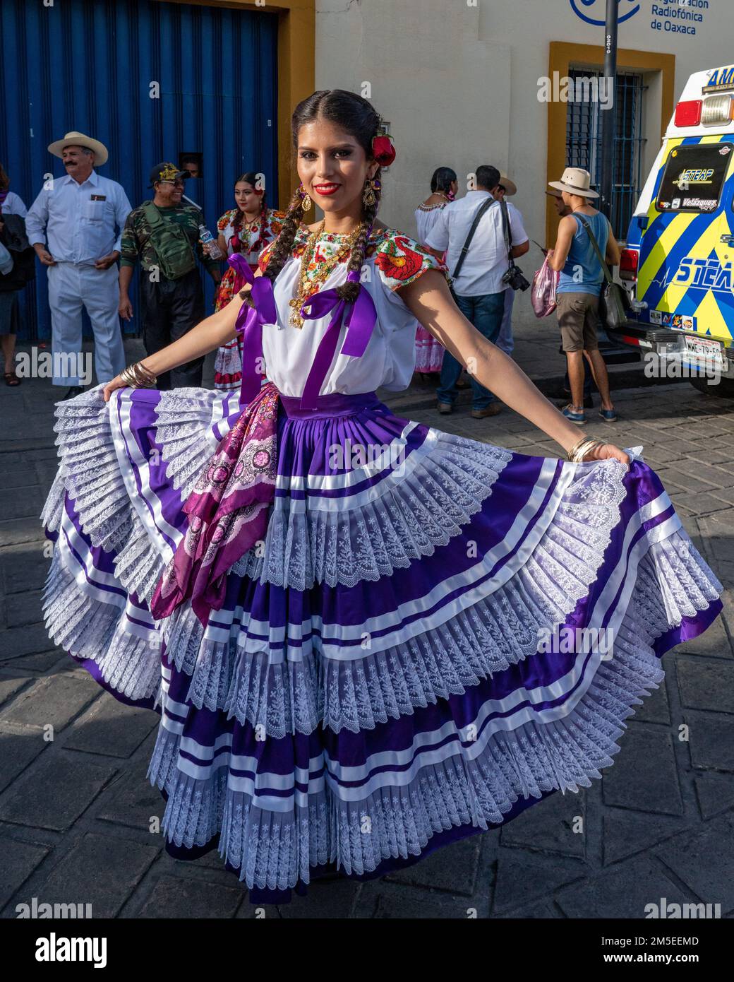 A young attractive dancer in traditional dress from Santiago Pinotepa ...