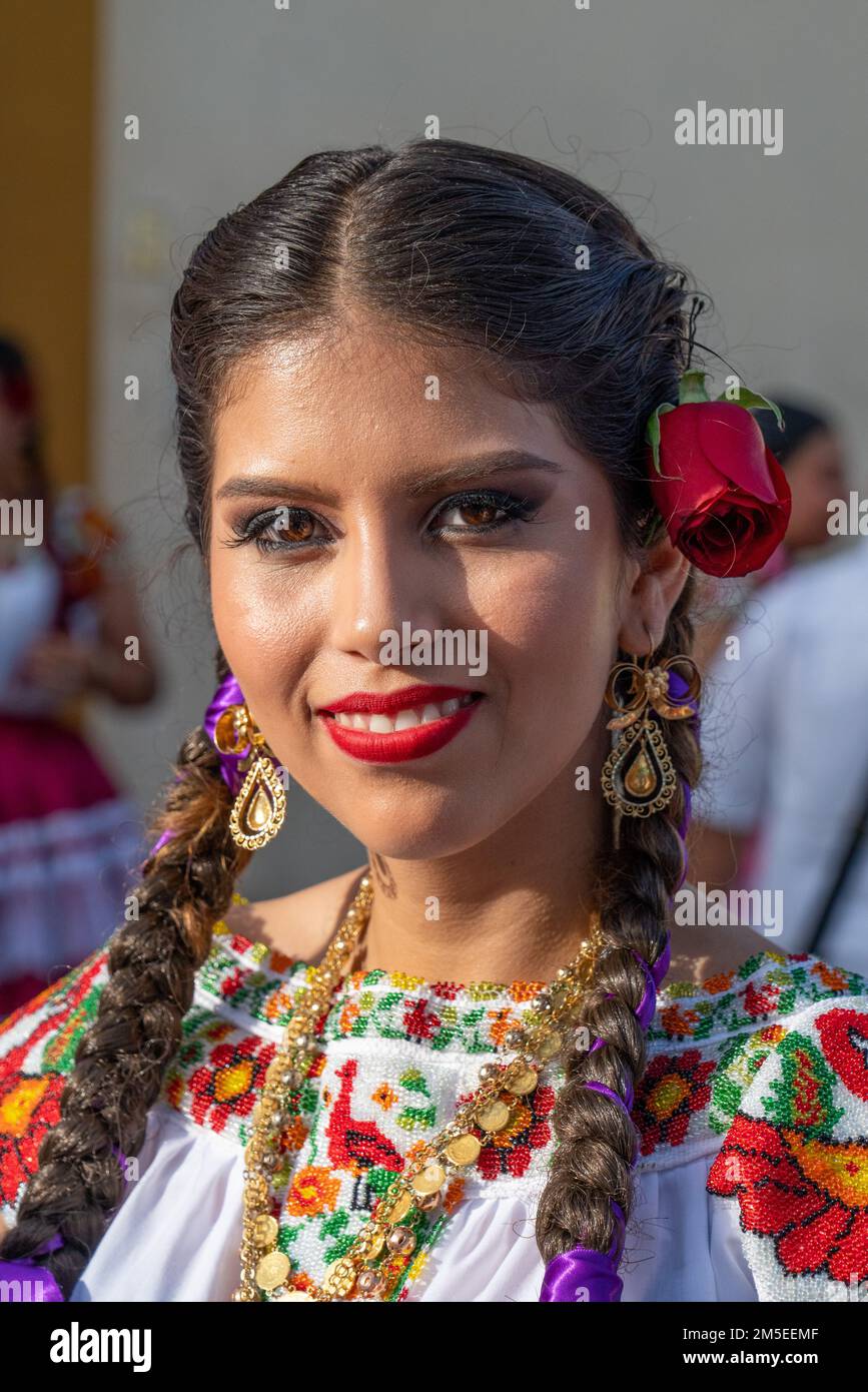 A young attractive dancer in traditional dress from Santiago Pinotepa ...