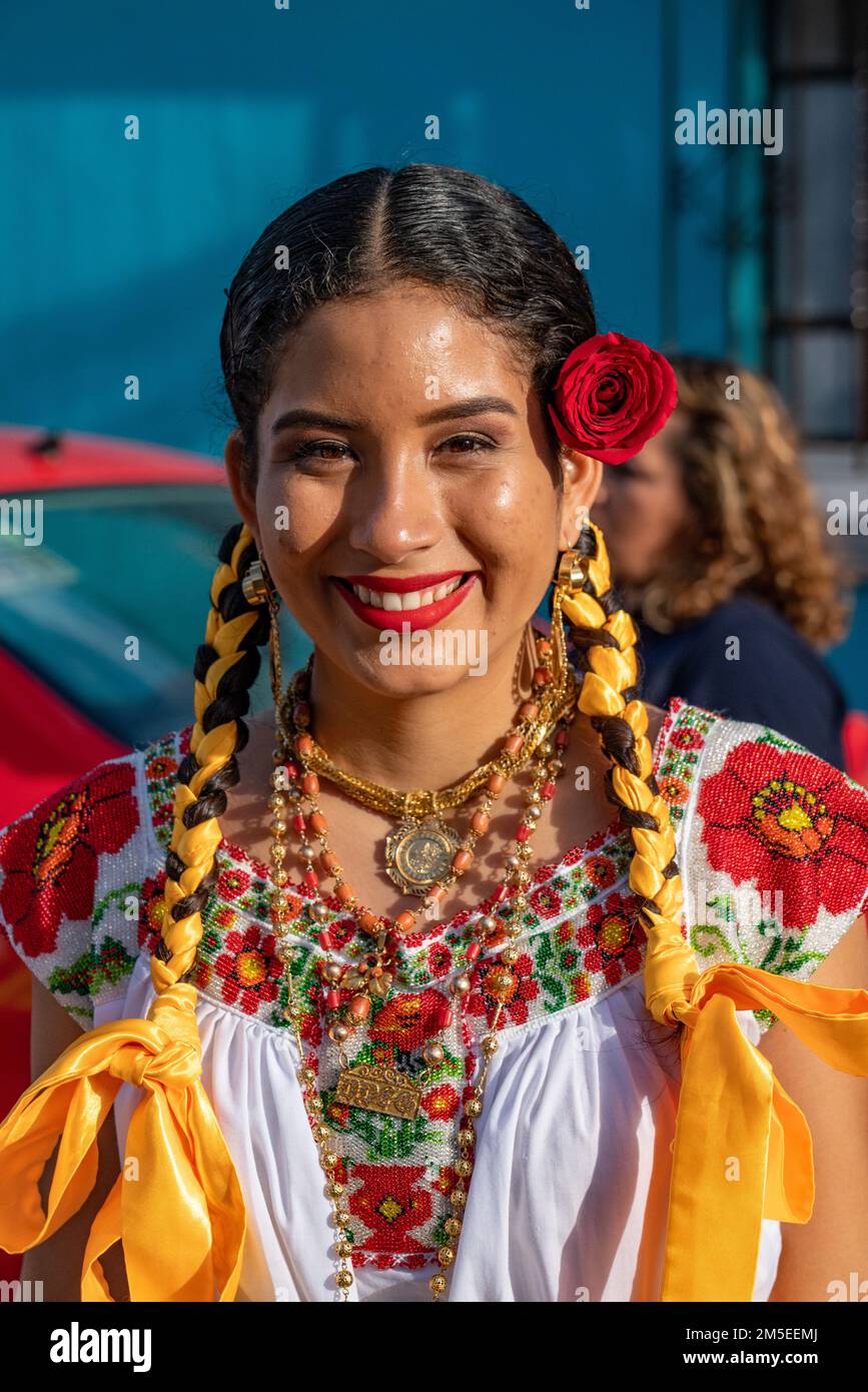 A young attractive dancer in traditional dress from Santiago Pinotepa ...