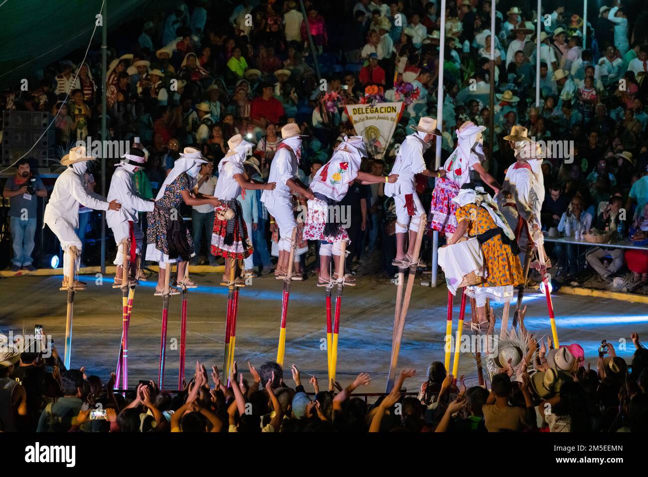 Zancudos De Zaachila Or Stilt Dancers Performing At A Guelaguetza Venue