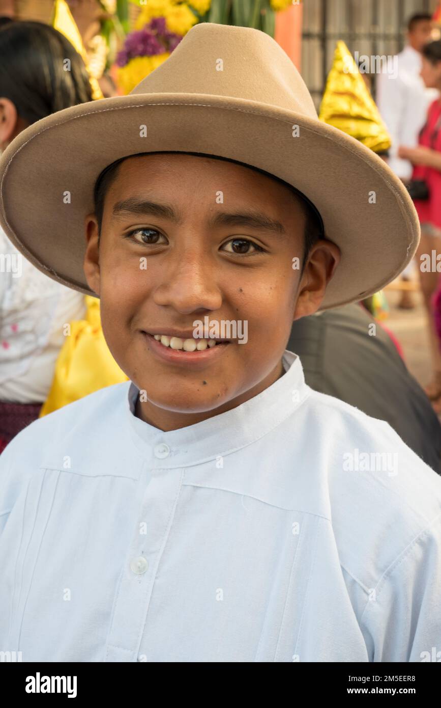 A portrait of a young farolero dancer from the Chinas Oaxaquenas dance ...