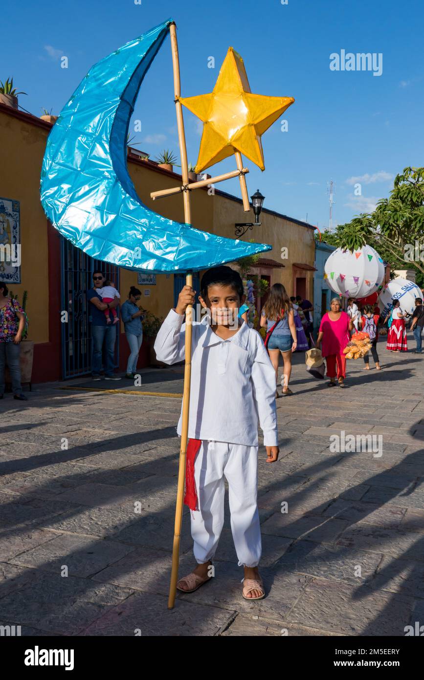 A portrait of a young farolero dancer from the Chinas Oaxaquenas dance ...