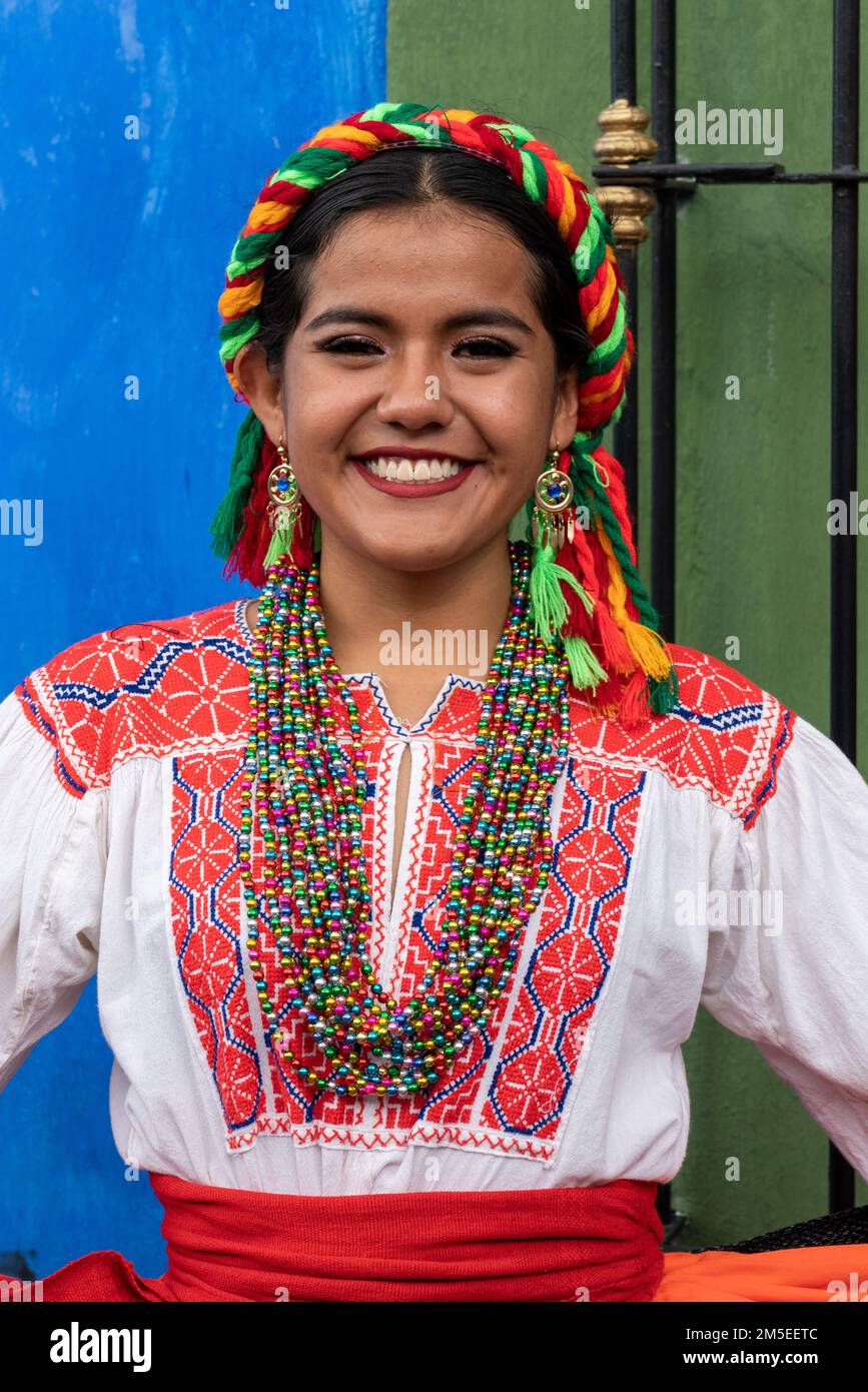A woman in her traditional Jarabe dance outfit from Ejutla poses at the ...