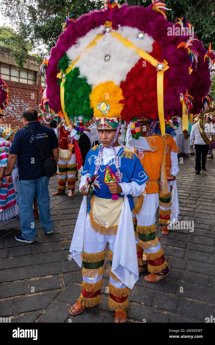 An Aztec warrior dancer from the Danza la Pluma at the Guelaguetza ...