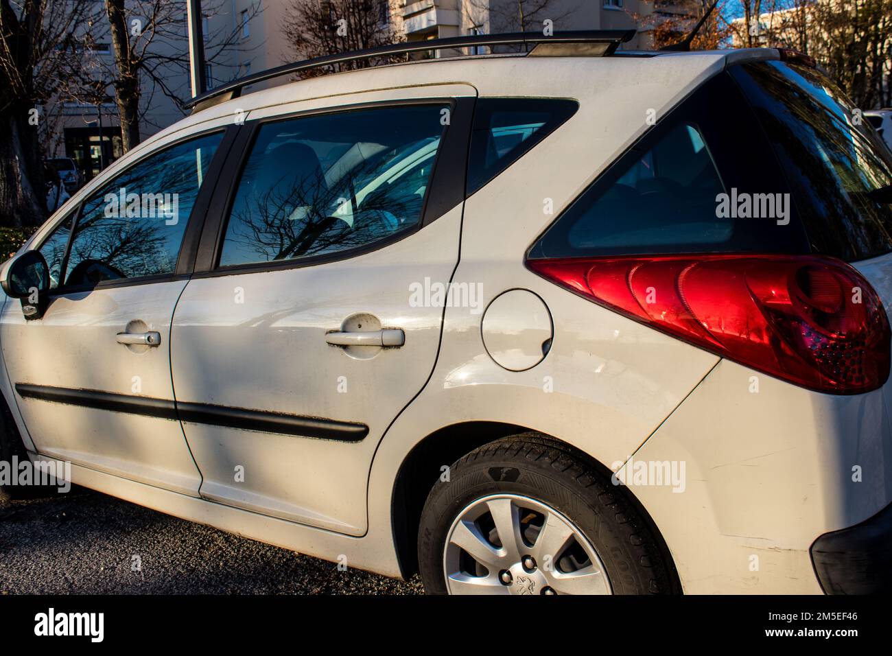 Reims, France - December 27, 2022 Various cars parked in the downtown ...