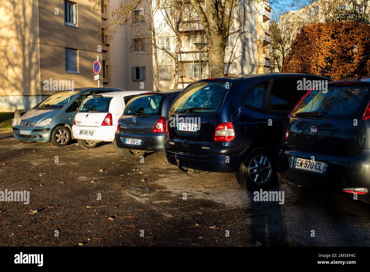 Reims, France - December 27, 2022 Various cars parked in the downtown ...