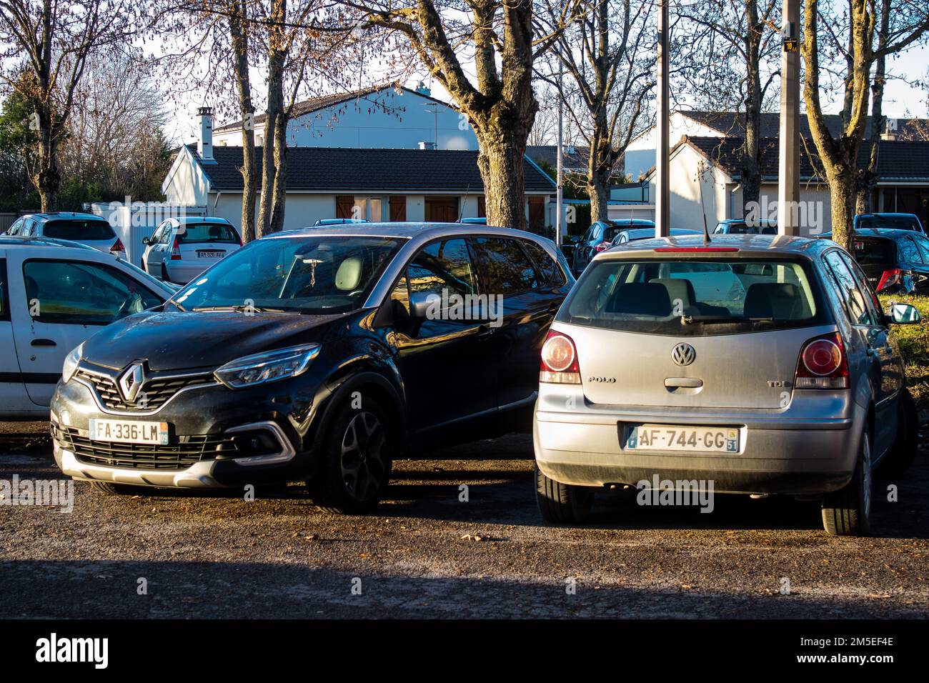 Reims, France - December 27, 2022 Various cars parked in the downtown ...