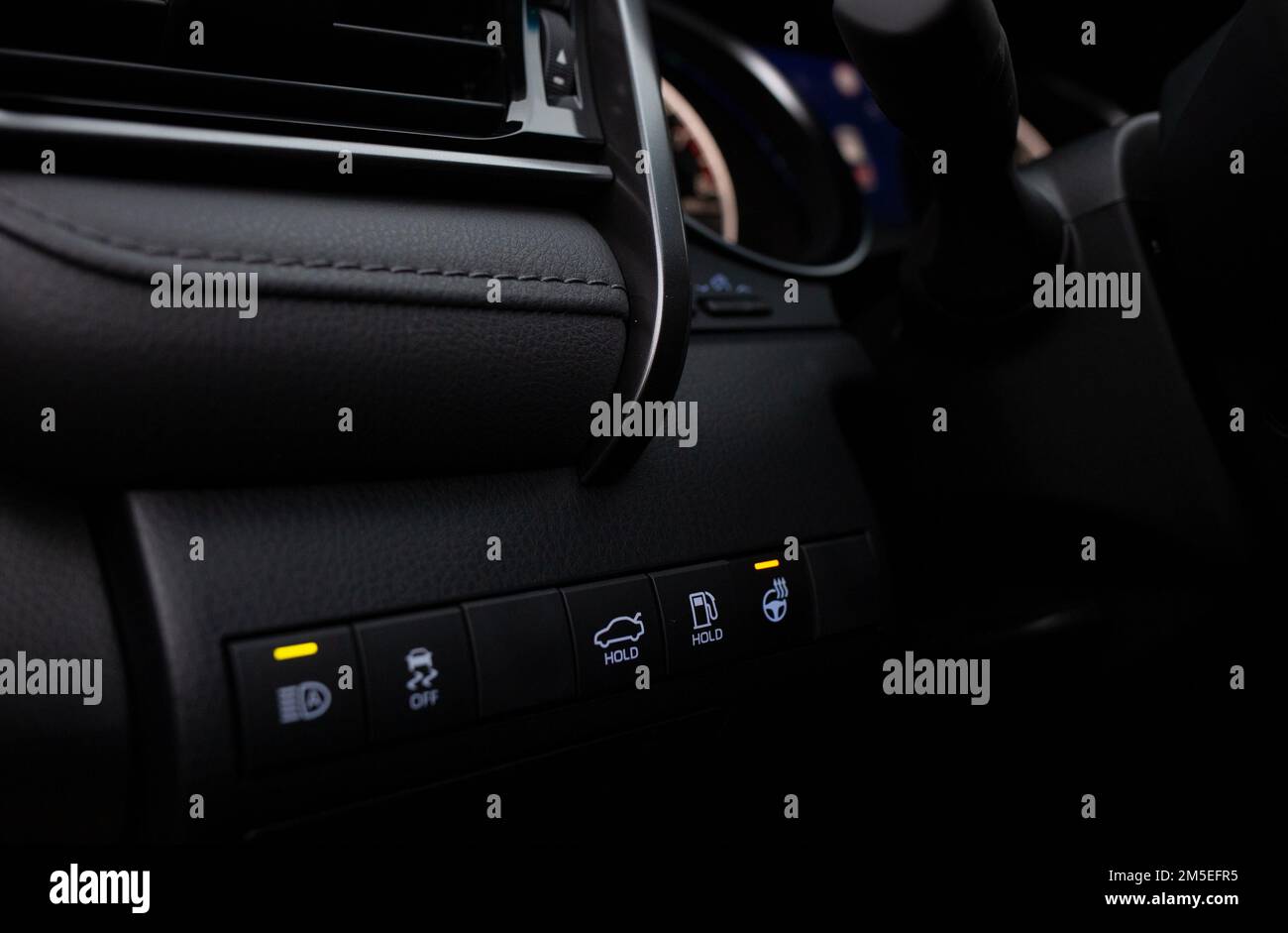 Car buttons on a control panel background, car elements close view ...