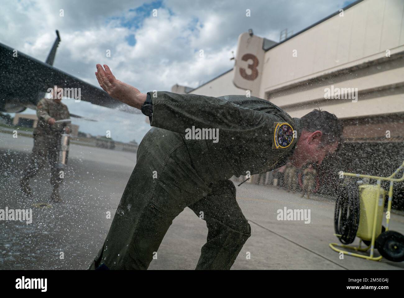 Col. Sean Bittner, 413th Flight Test Group commander, receives a ...