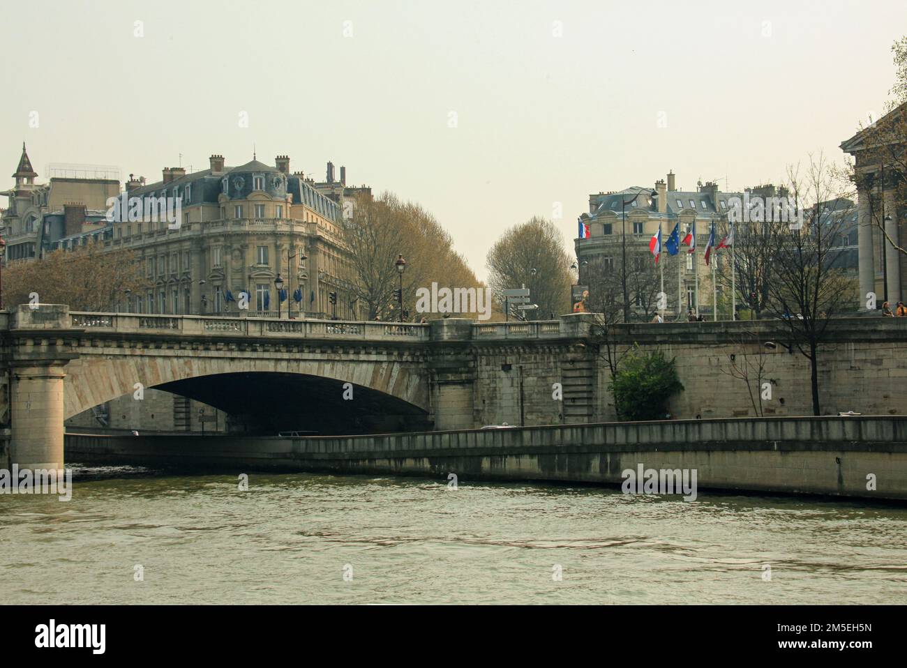 A historic bridge and nearby old buildings in Paris, France Stock Photo ...