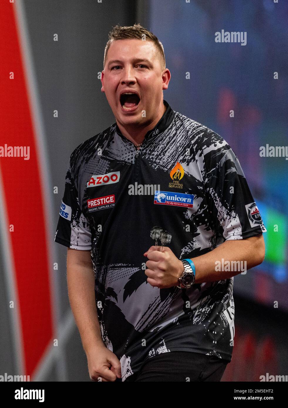 Chris Dobey celebrates winning against Gary Anderson during day eleven ...