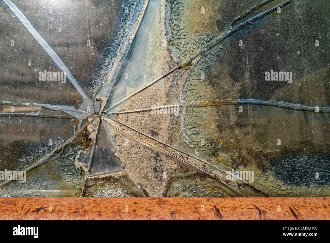 The detail of a crack in the window of an antique panel truck Stock ...