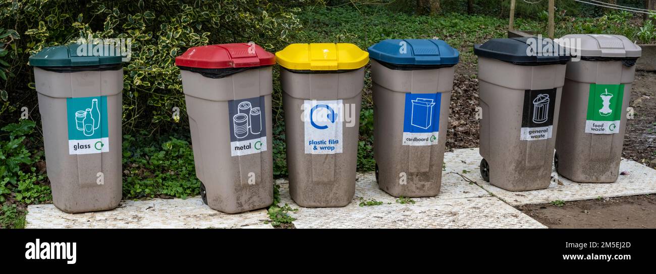 Row of recycling bins in a park Stock Photo - Alamy