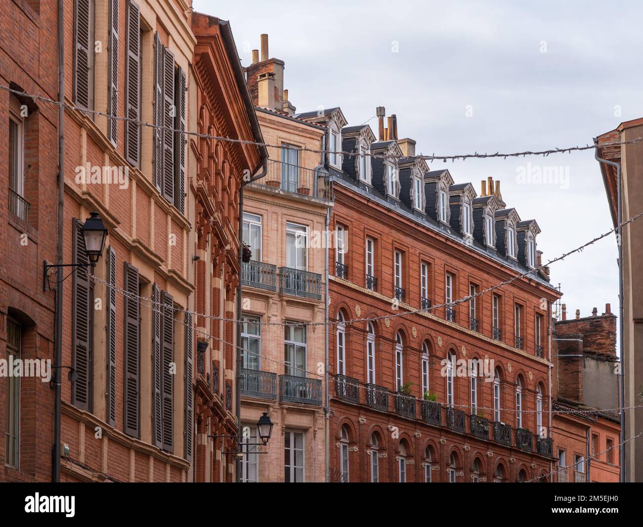 View of colorful ancient brick buildings in the historic center of the ...