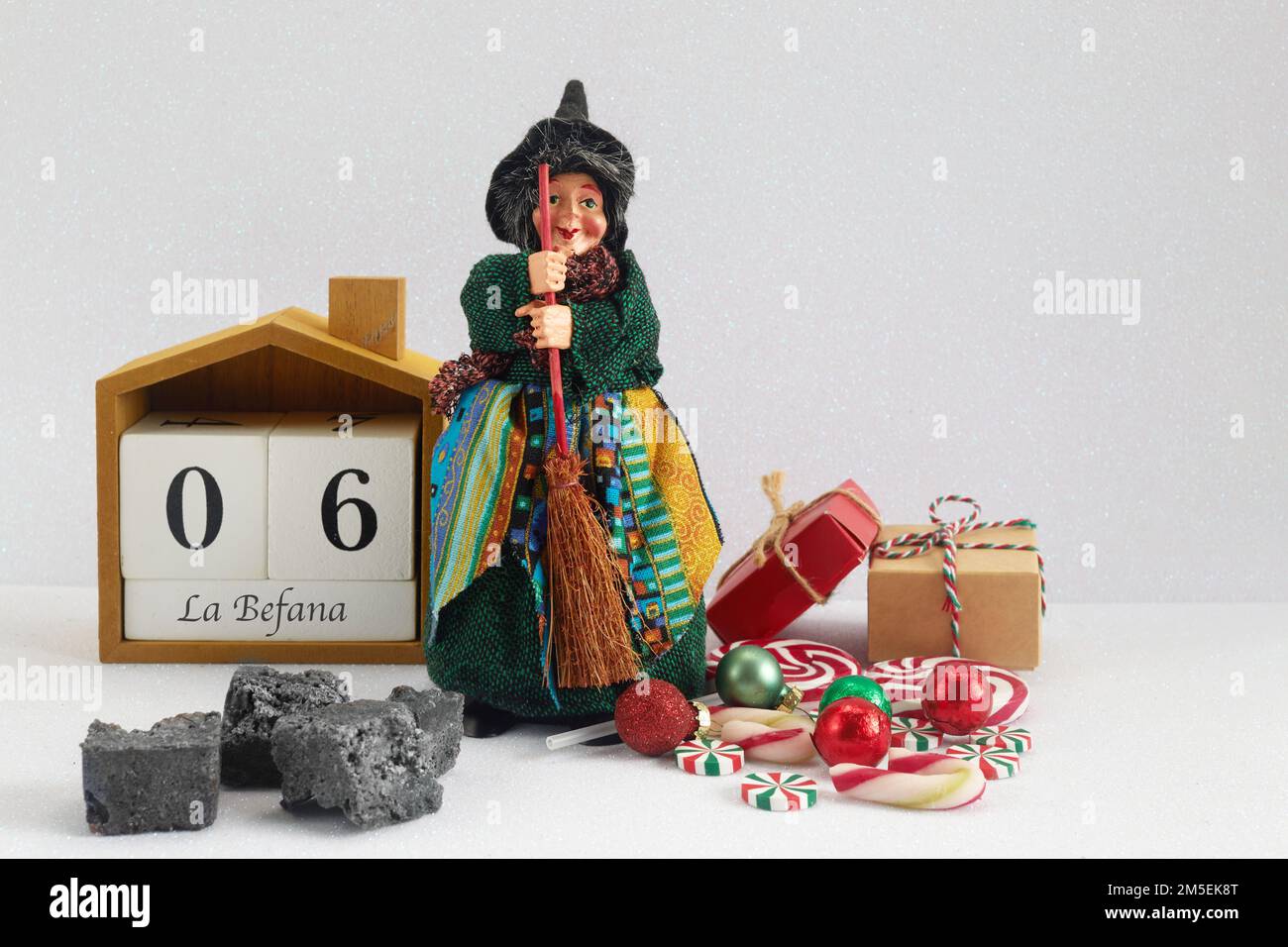 The Befana with sweet coal and candy. Italian Epiphany day tradition ...