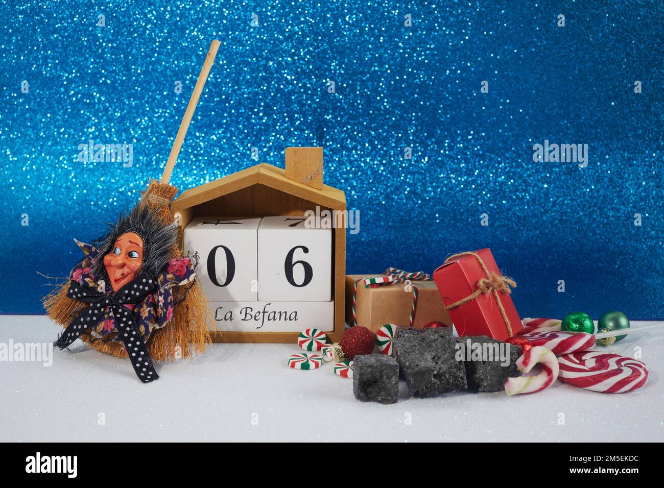 The Befana with sweet coal and candy. Italian Epiphany day tradition ...