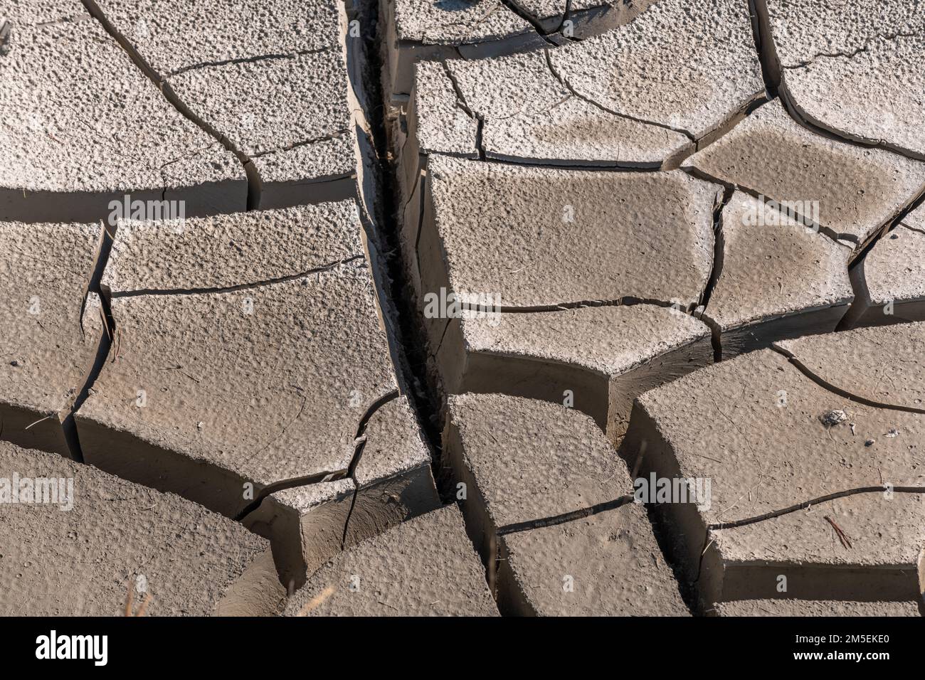 Earth cracked in times of drought and extreme heat. France Stock Photo ...