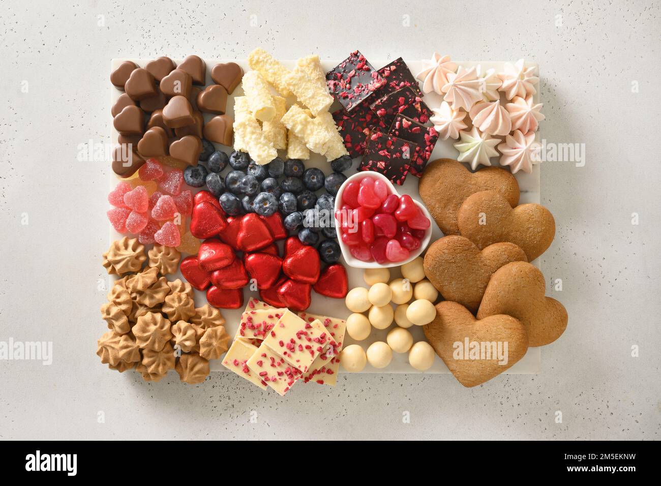 Charcuterie Valentines Day sweet board with chocolate, red hearts ...