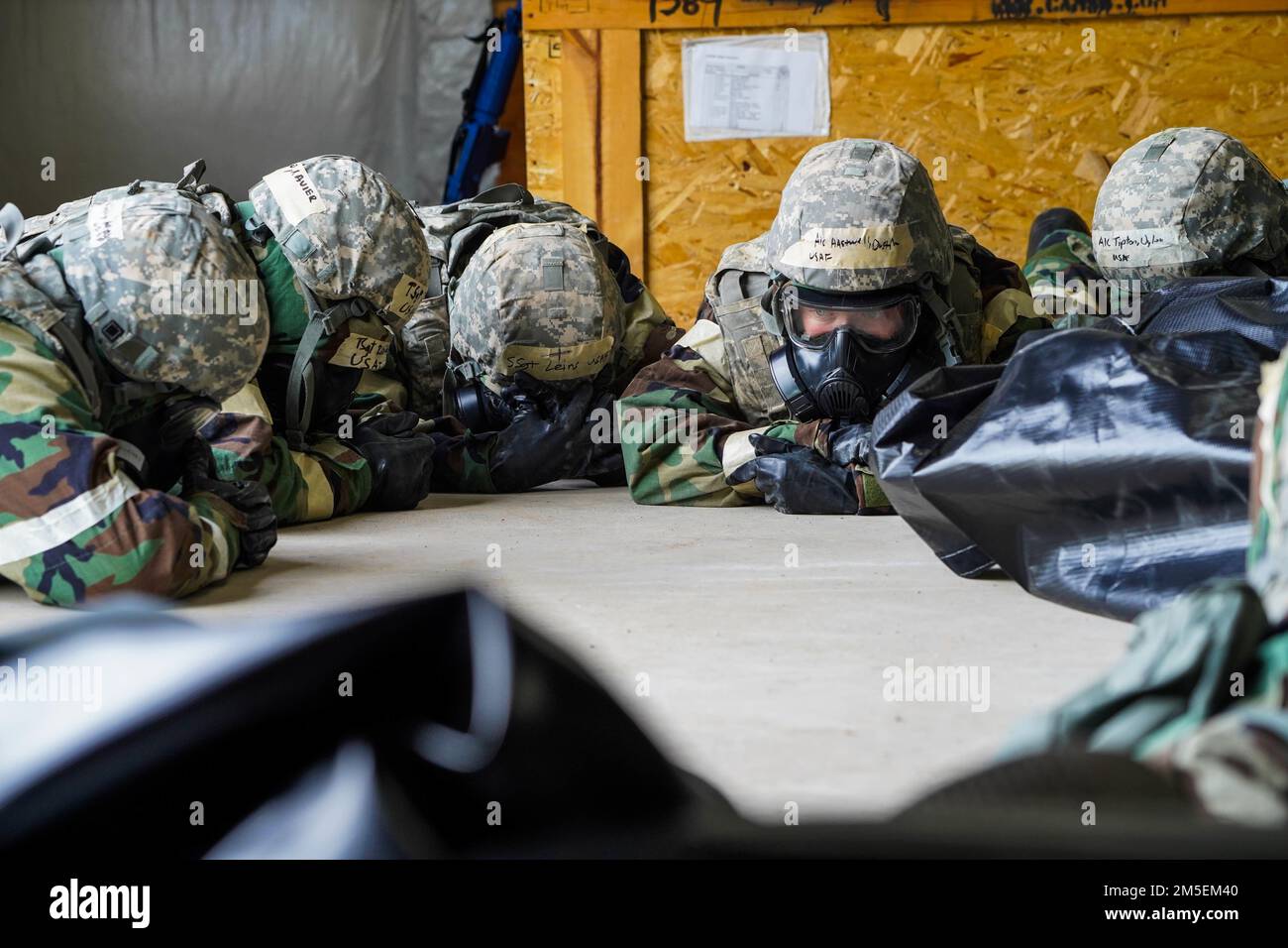 Airmen assigned to the 647th Civil Engineer Squadron don their Mission ...