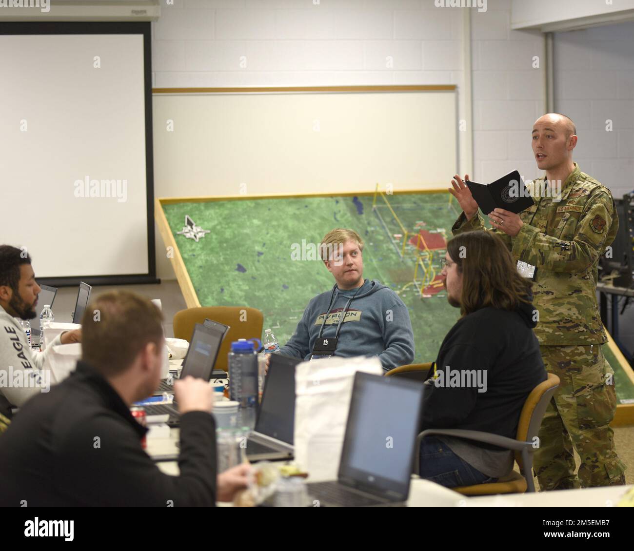 U.S. Air Force Tech. Sgt. Ezekiel Wieland, right, 272nd Cyber ...