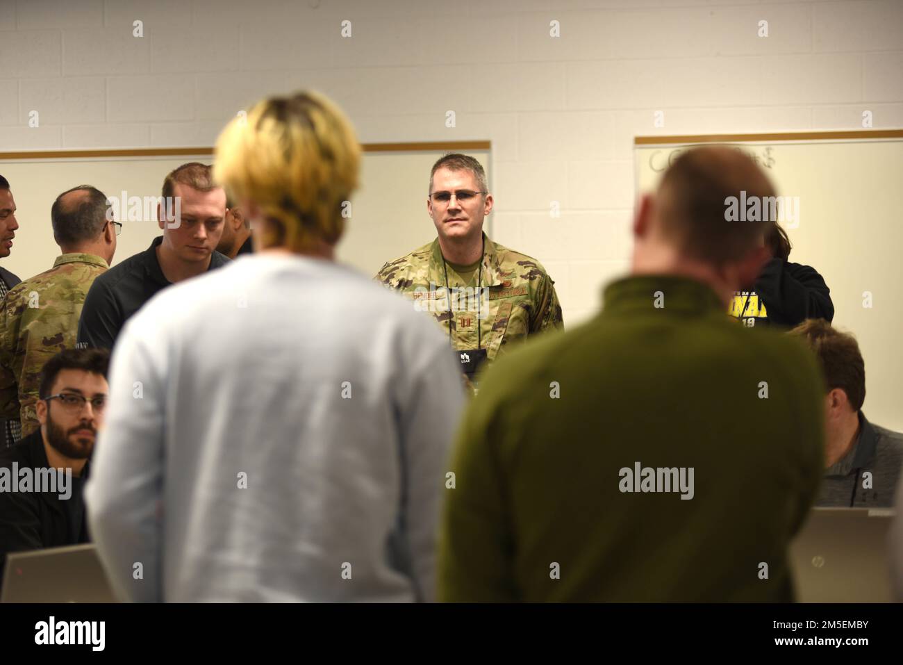 U.S. Air Force Capt. Shannon Bender, center, 272nd Cyber Operations ...