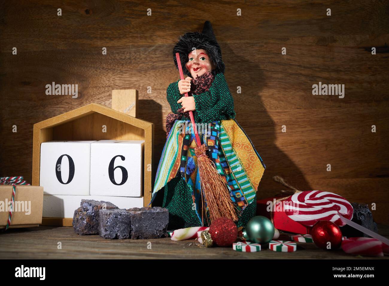 The Befana with sweet coal and candy. Italian Epiphany day tradition ...