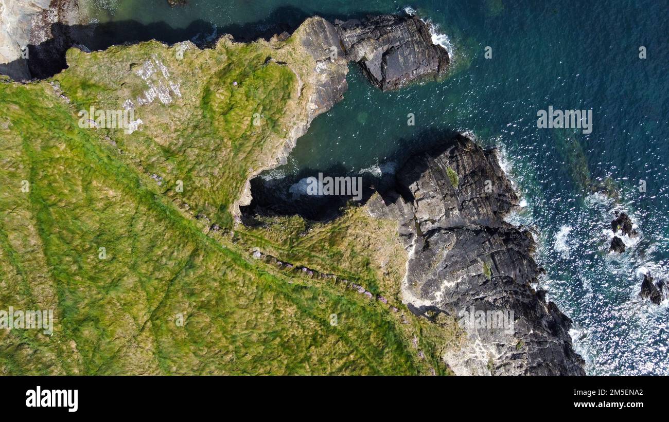 Grassy cliffs on the Atlantic Ocean coast. Landscape of Ireland from a ...