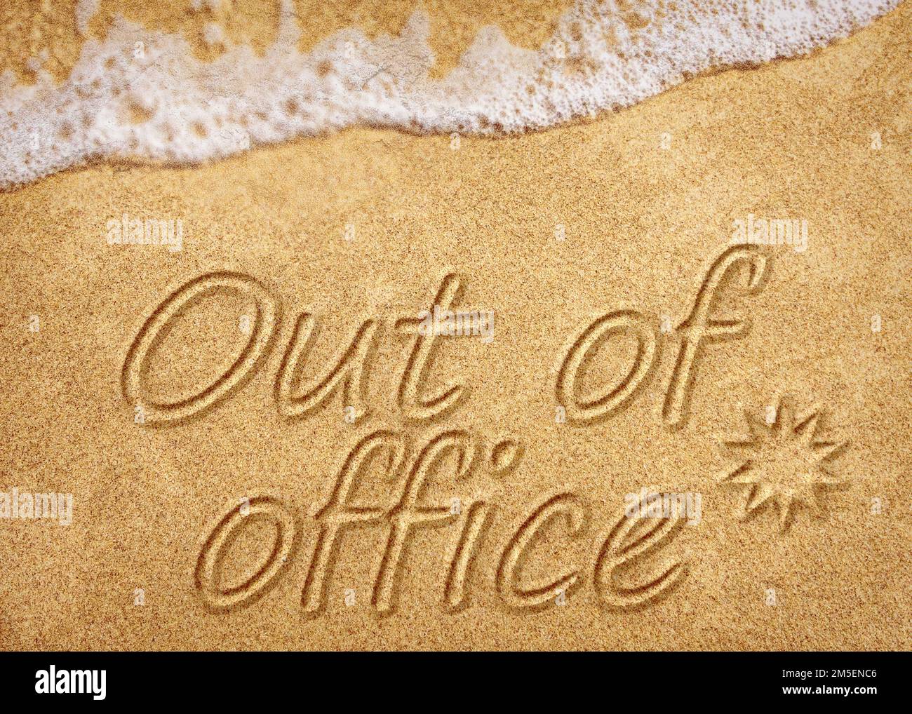 Out of office sign on beach sand Stock Photo - Alamy