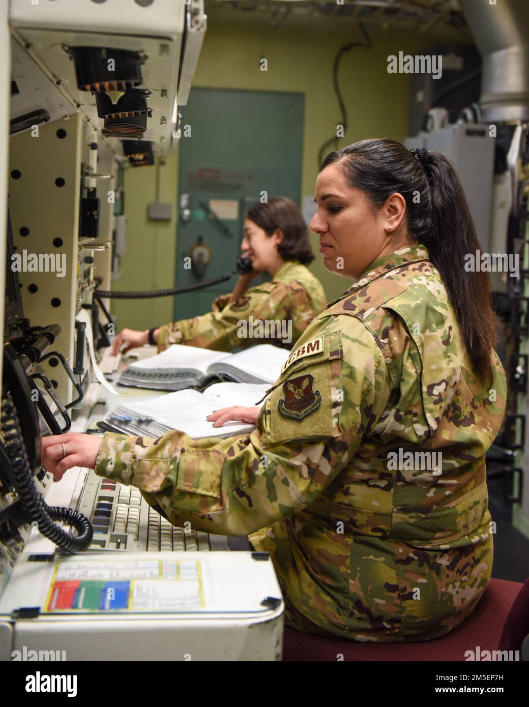 Col. Kristen Nemish, commander of the 91st Operations Group, and Capt ...