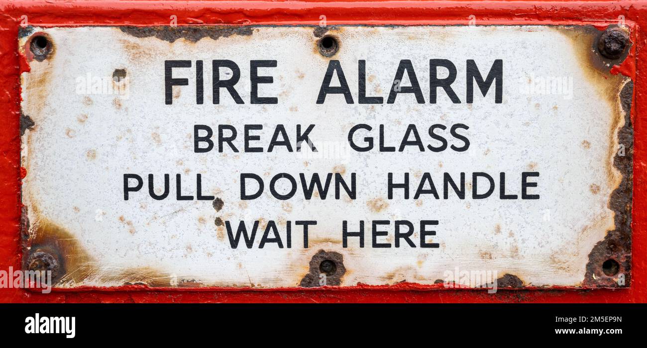 Vintage fire alarm sign Stock Photo - Alamy
