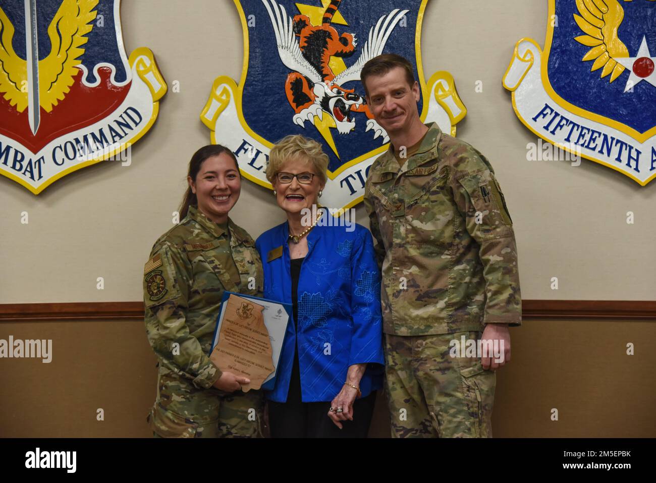 U.S. Air Force Col. Russell Cook, 23rd Wing commander, right, and Dr ...