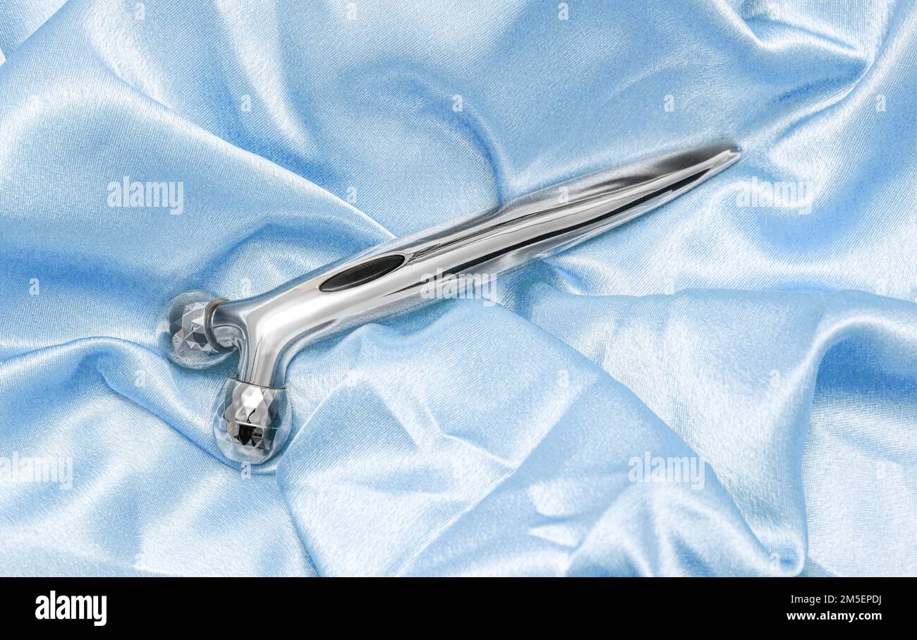 Silver metal ball roller for face massage. Facial massage tools. Beauty ...
